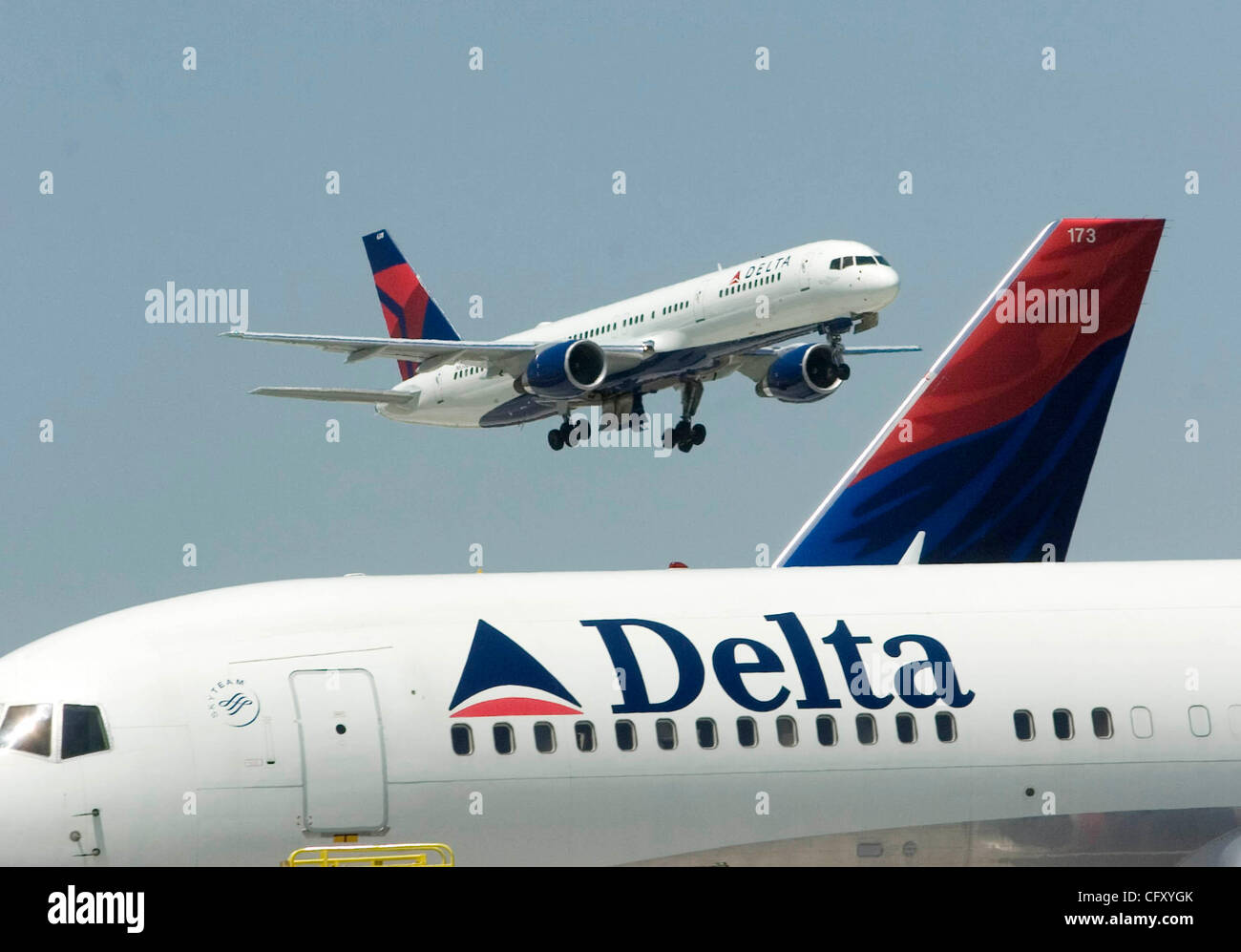 A newly painted Delta Air Lines jet takes off during a post-bankruptcy ...