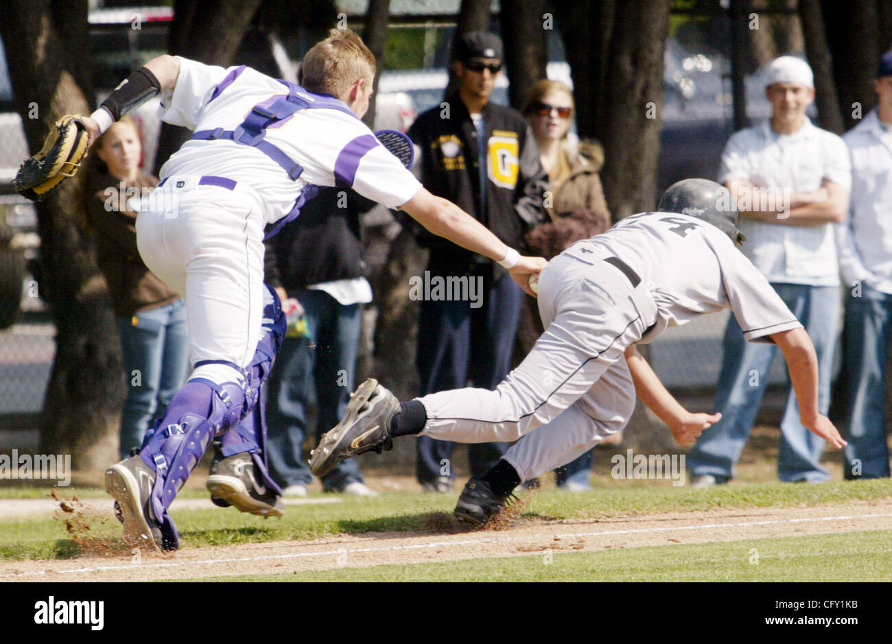 Amador catcher Scott David tags Granada's Kyle Holmstrom who over ran ...