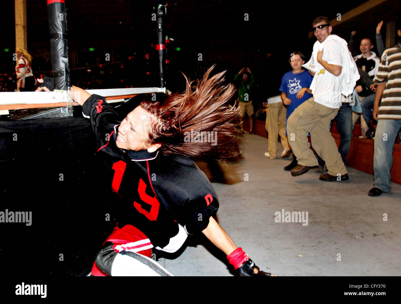 Stephanie Garcia of the Brooklyn Red Devils grimaces in pain after she ...