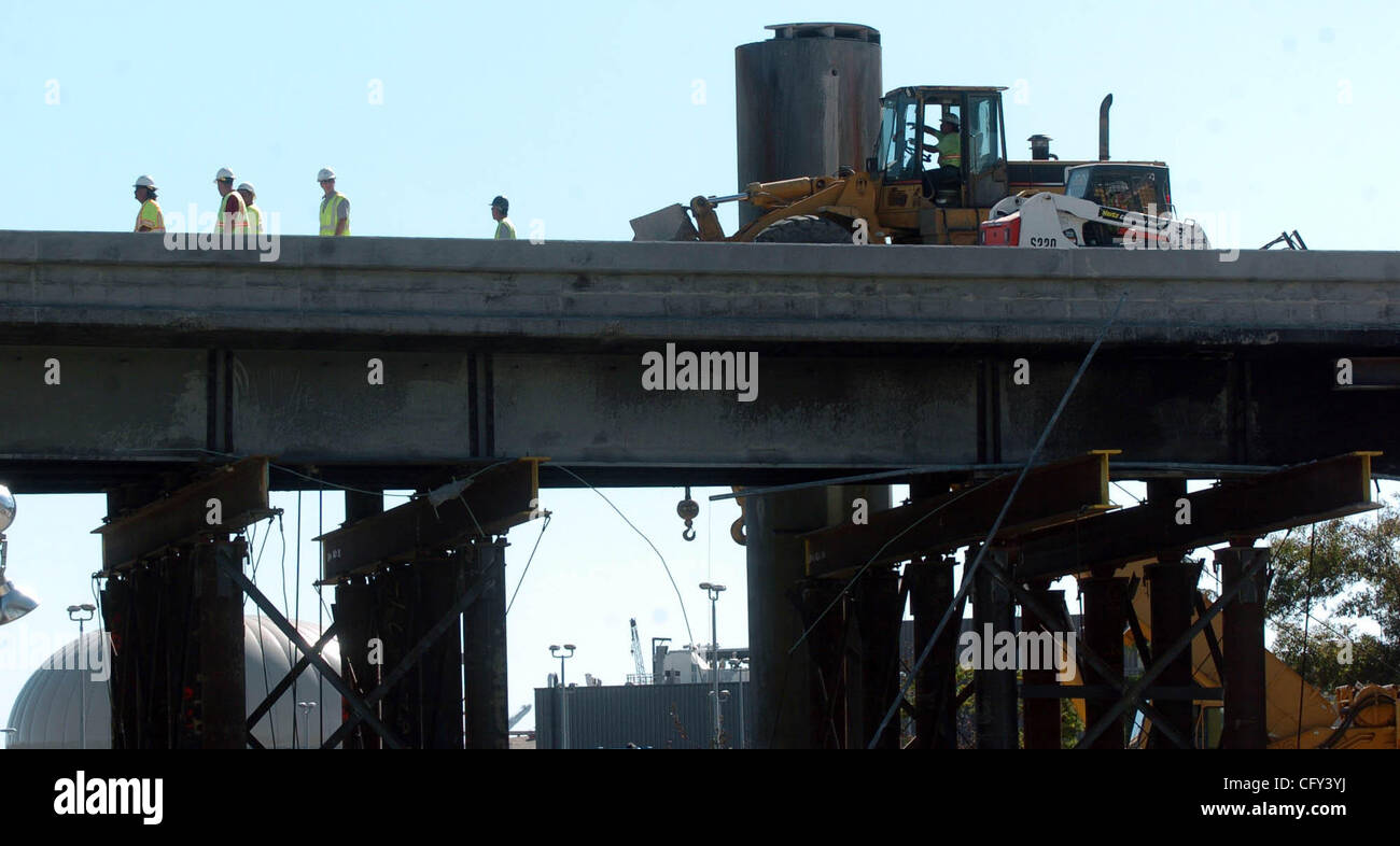 Workers make last minute repairs on the 880 southband connector ramp on ...