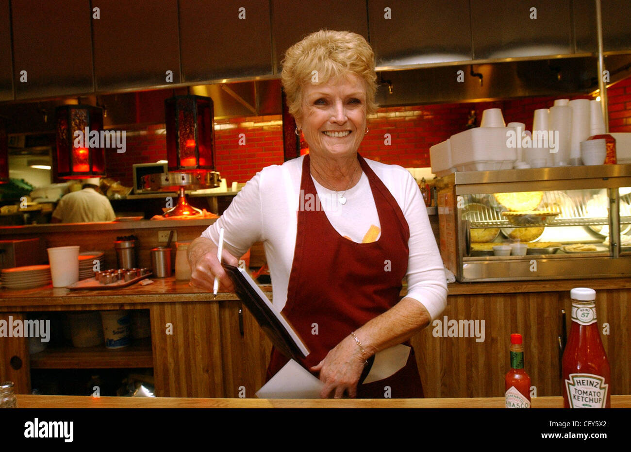 On Monday, May 7, 2007 waitress Ollie Armstrong serves the lunch crowd ...