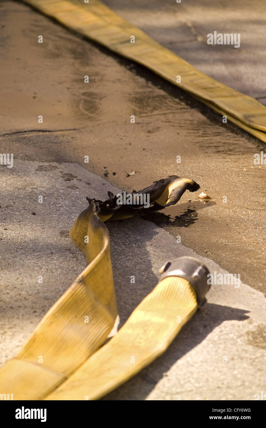 A burnt fire hose in Griffith Park, Los Angeles. Authorities said the ...
