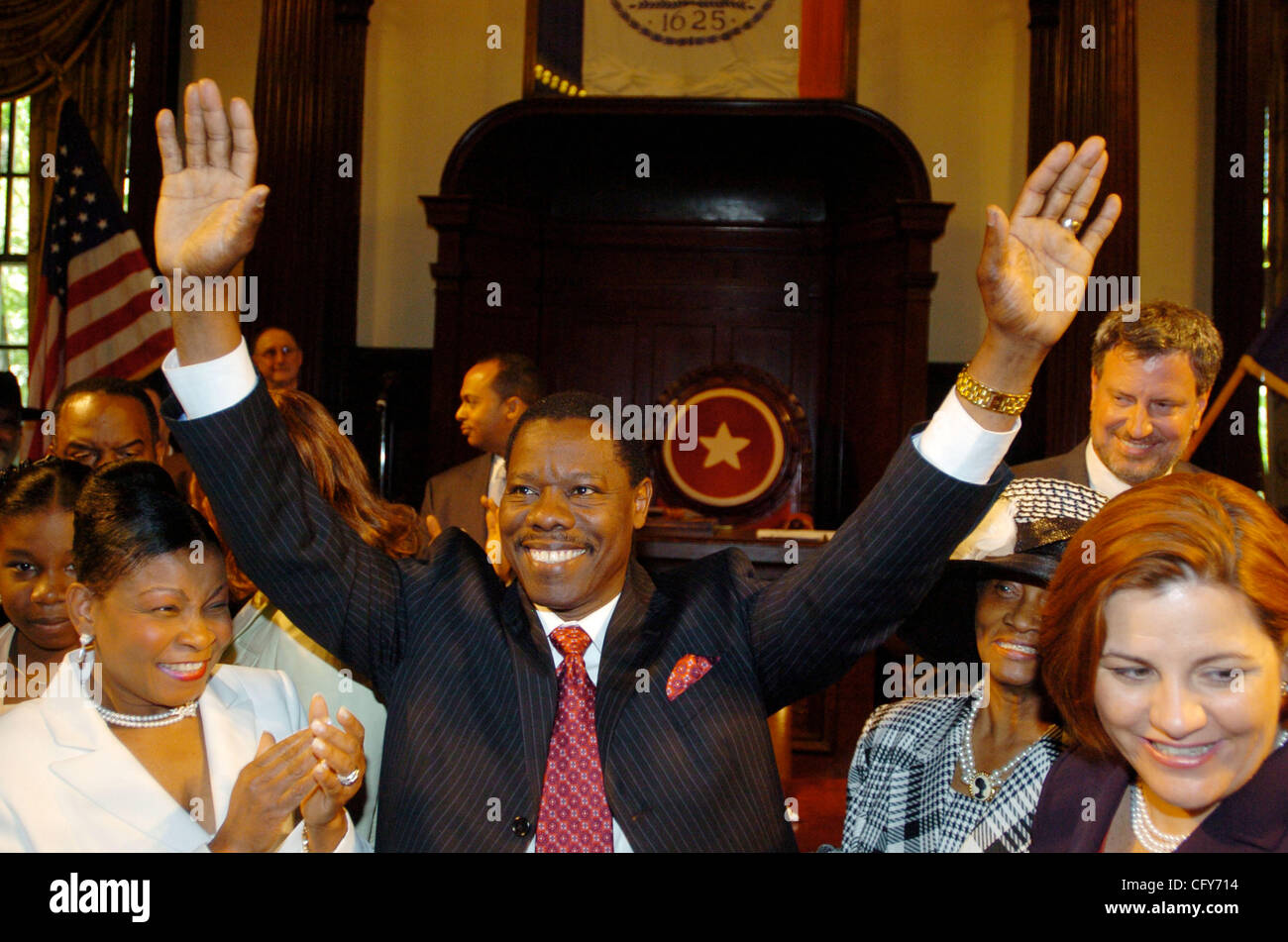 Mathieu Eugene reacts after being sworn in. Mathieu Eugene is sworn in ...