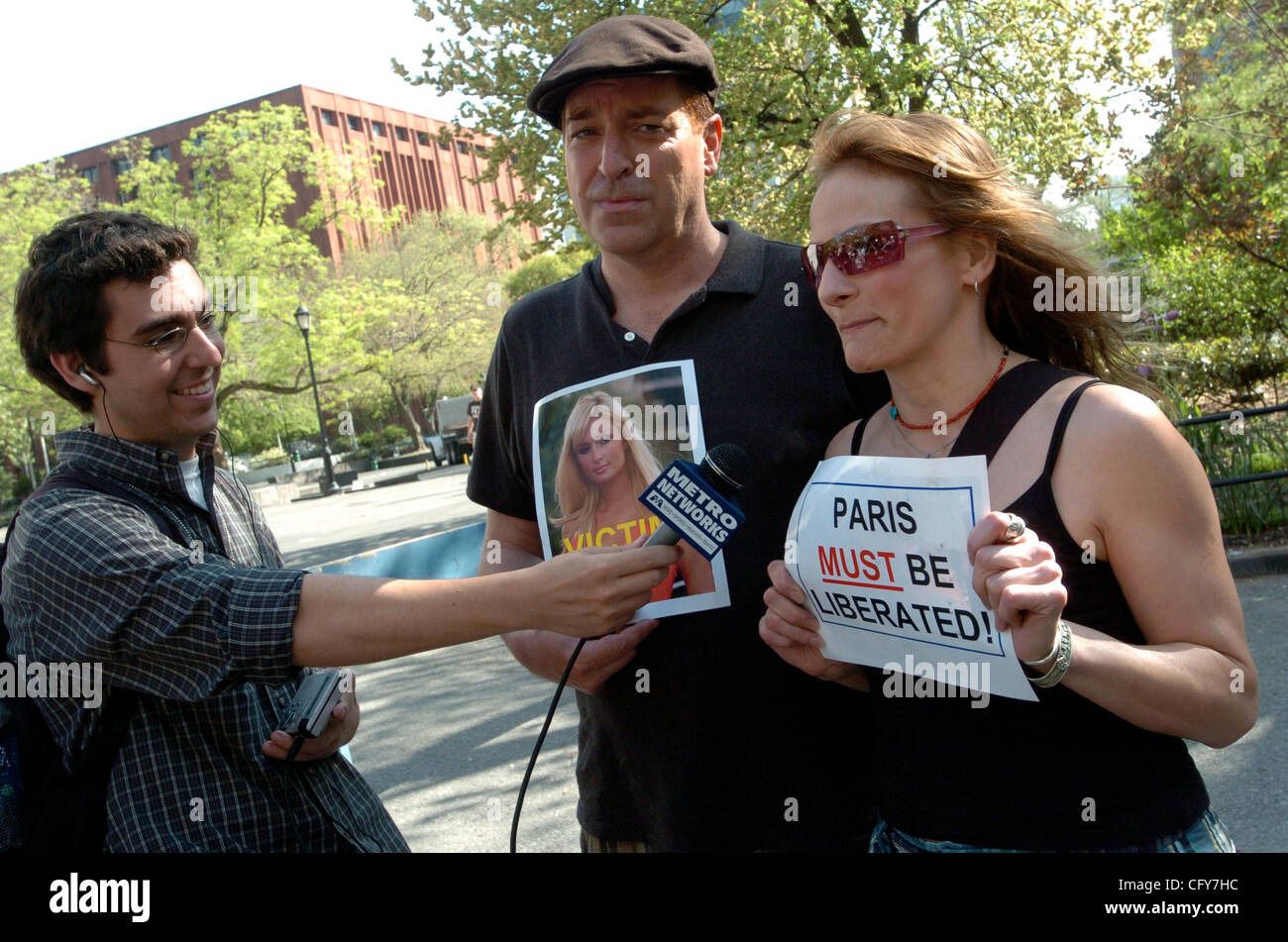 Gregory Moore (L) and Chris Weller (R), both of Manhattan, hold up ...