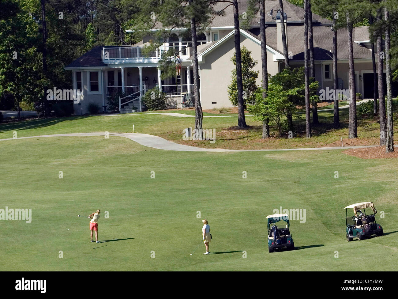 GREENSBORO, GA - MAY 10: People golf at the Harbor Club gated community ...