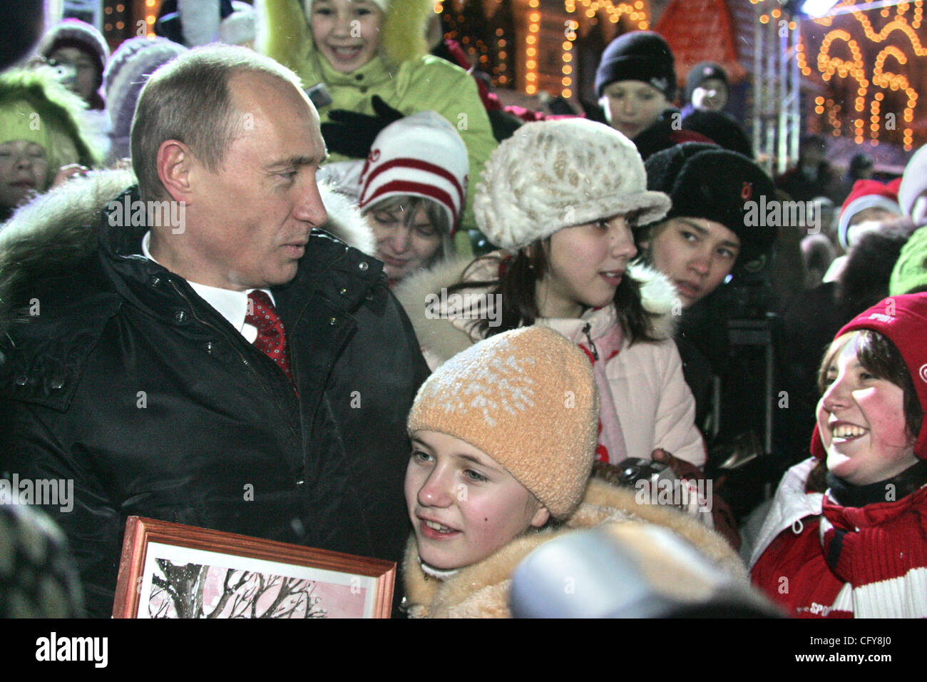 Vladimir Putin with russian kids at the skating rink on the Red Square ...
