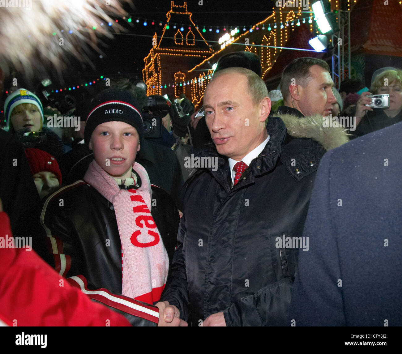 Vladimir Putin with russian kids at the skating rink on the Red Square ...