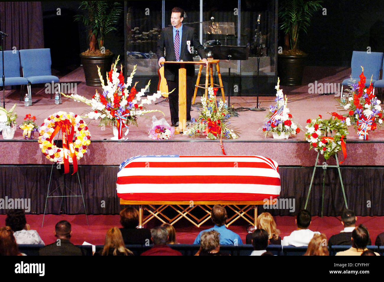 Pastor Tim Voogd leads the service for fallen Marine Cpl. Charles ...
