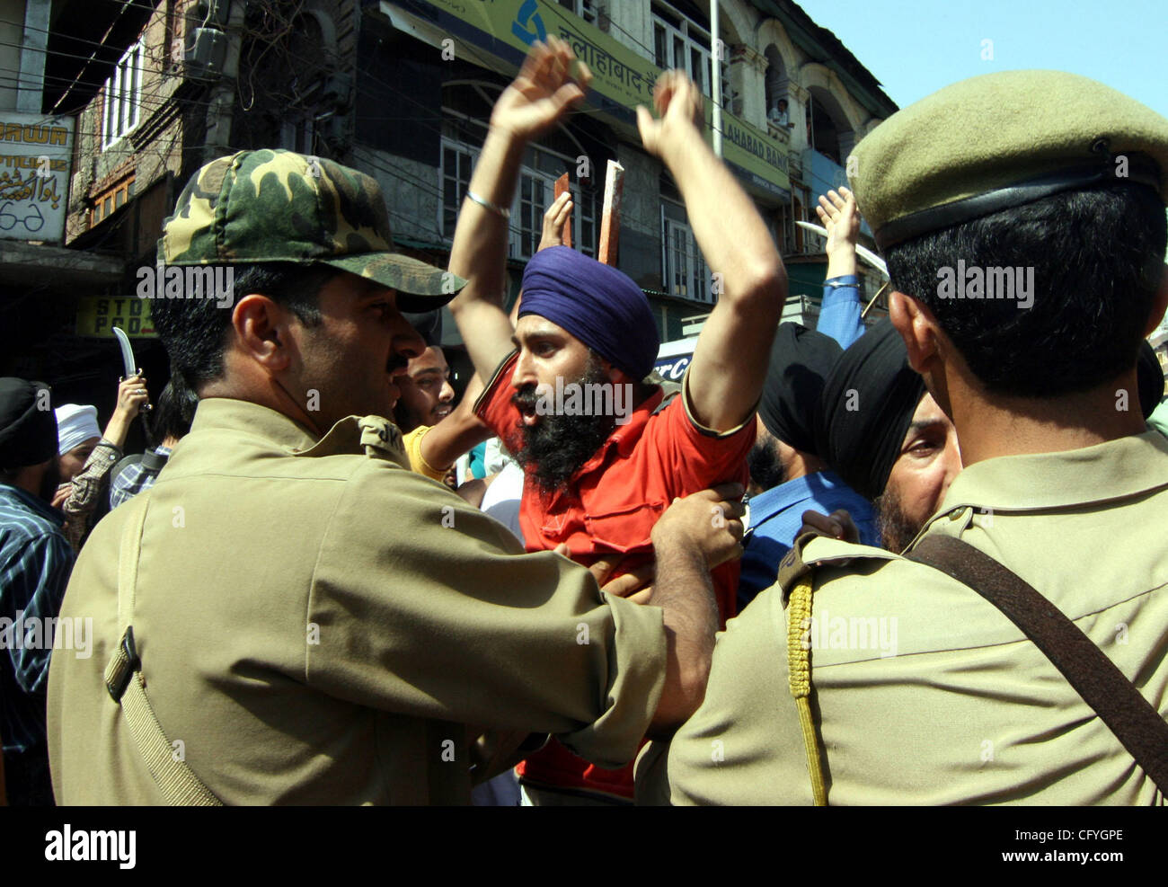 Indian police with sticks hi-res stock photography and images - Alamy