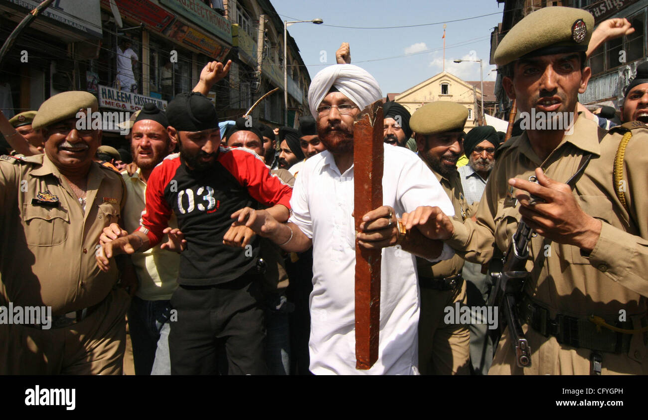 Indian police with sticks hi-res stock photography and images - Alamy