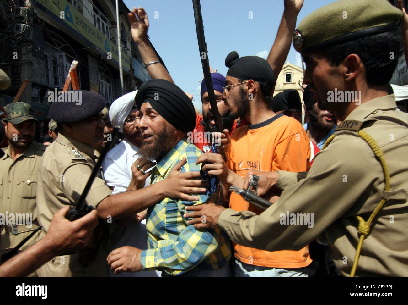 Indian police with sticks hi-res stock photography and images - Alamy