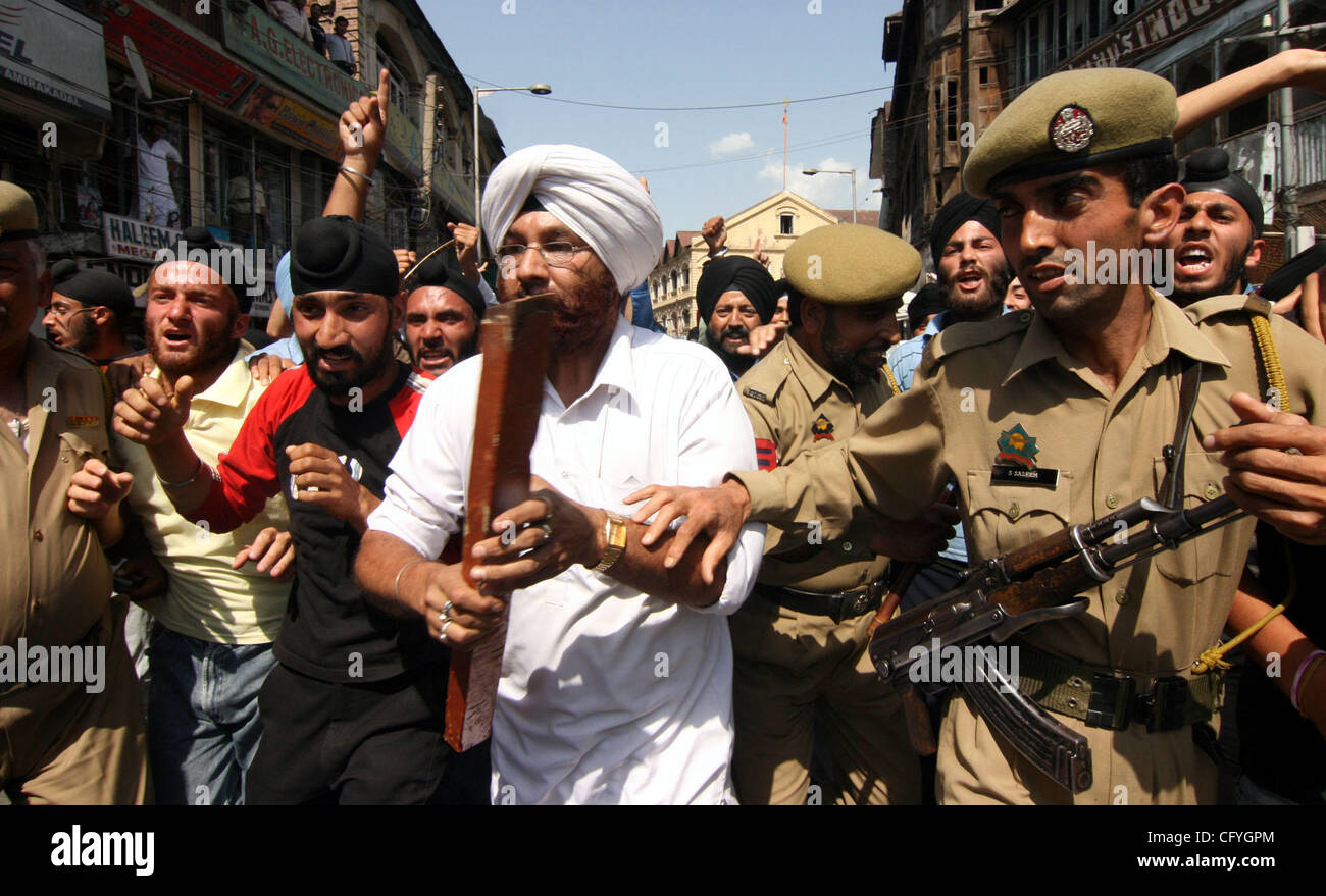 Indian police with sticks hi-res stock photography and images - Alamy