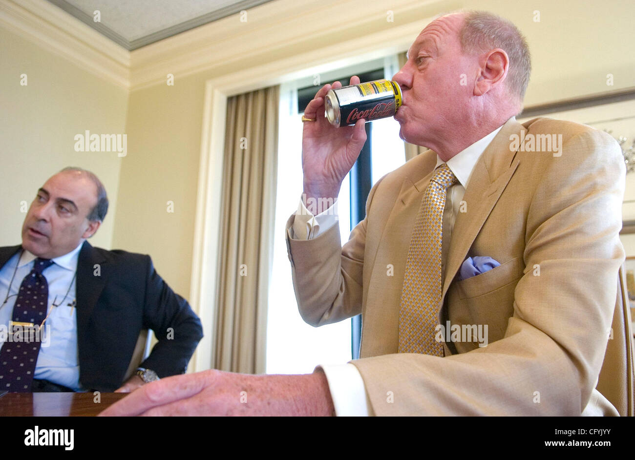 ATLANTA, GA - MAY 21: E. Neville Isell, chairman and CEO, right, and ...
