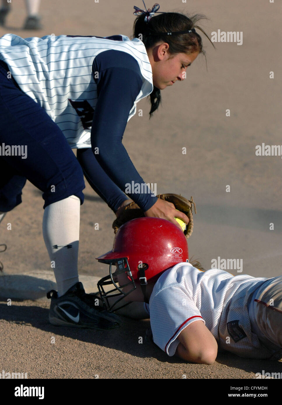 Freedom third baseman Danielle Gomez, left, tags out Berkeley's Sophie ...