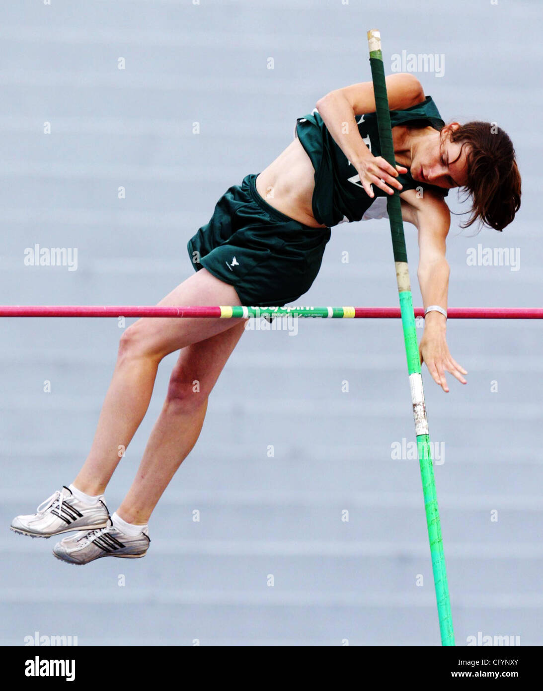 Rebecca Stein of San Ramon Valley crosses over the bar during the girls ...