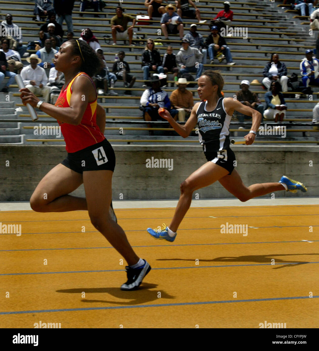 Berkeley's Erin Johnson, left, and Hercules' Arianna Mathews spring ...