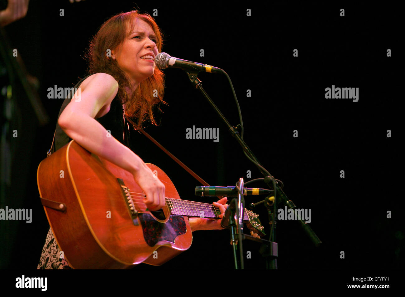 Gillian Welch performing with supporting vocals and guitar by David ...