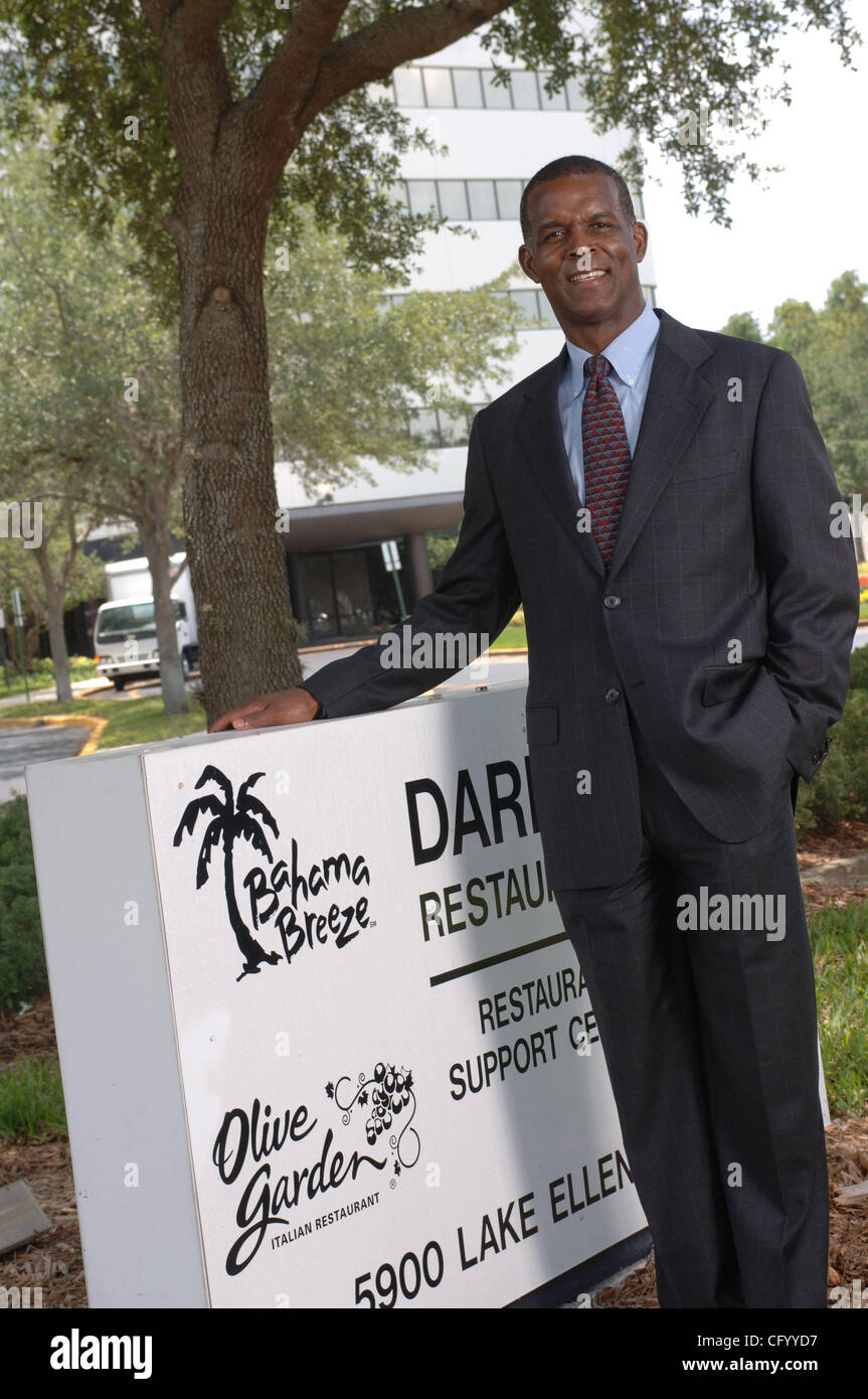 Darden Restaurants CEO Clarence Otis stands outside the company's ...