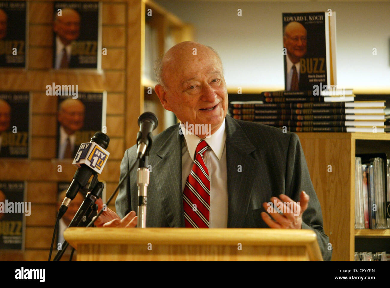 Former NYC Mayor Edward Koch singing his new book "Buzz" at Borders ...