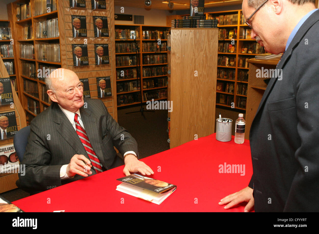 Former NYC Mayor Edward Koch singing his new book "Buzz" at Borders ...