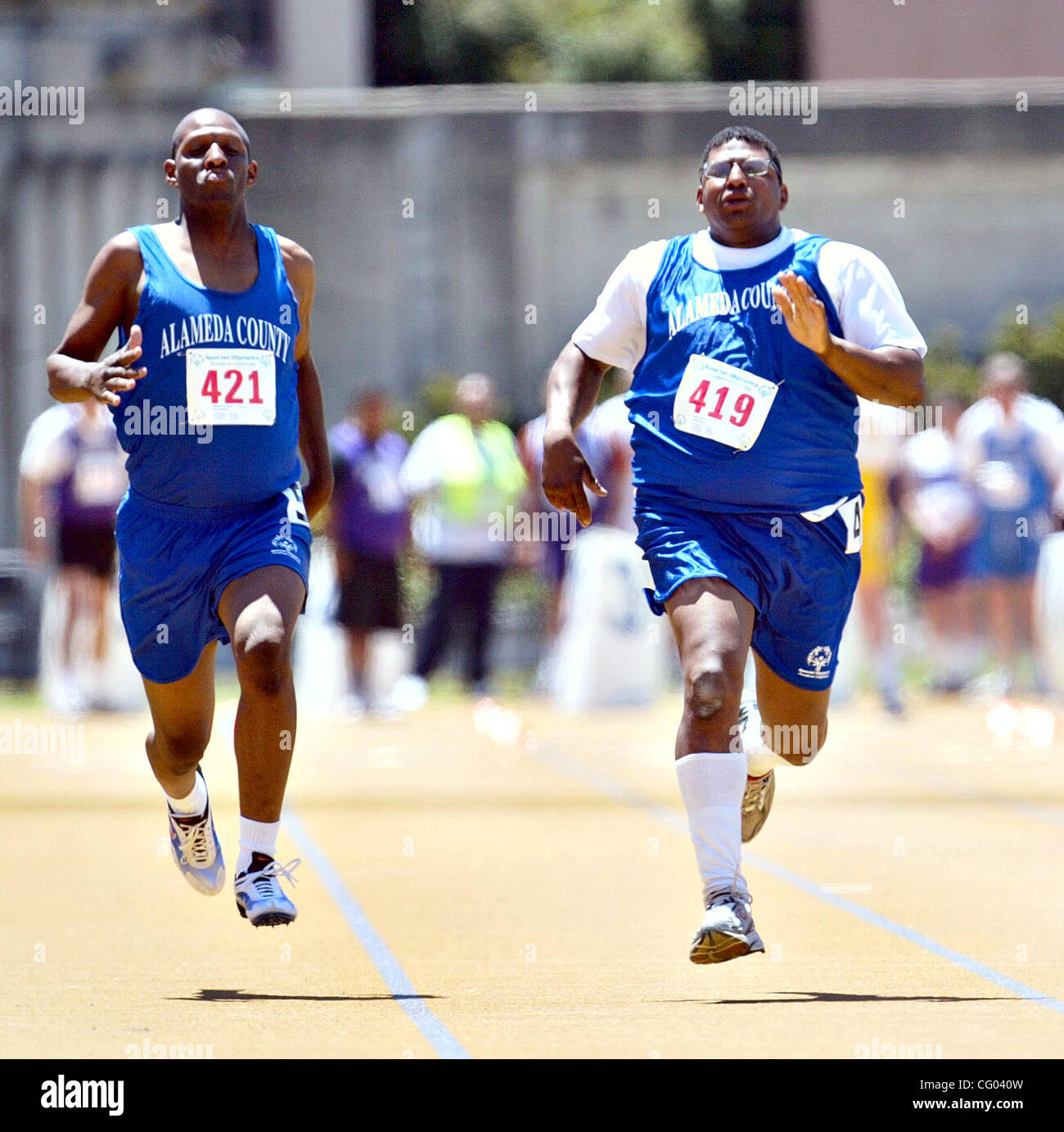Elise Garner Sr., left, and Jason Fox, both of Oakland, compete in the ...