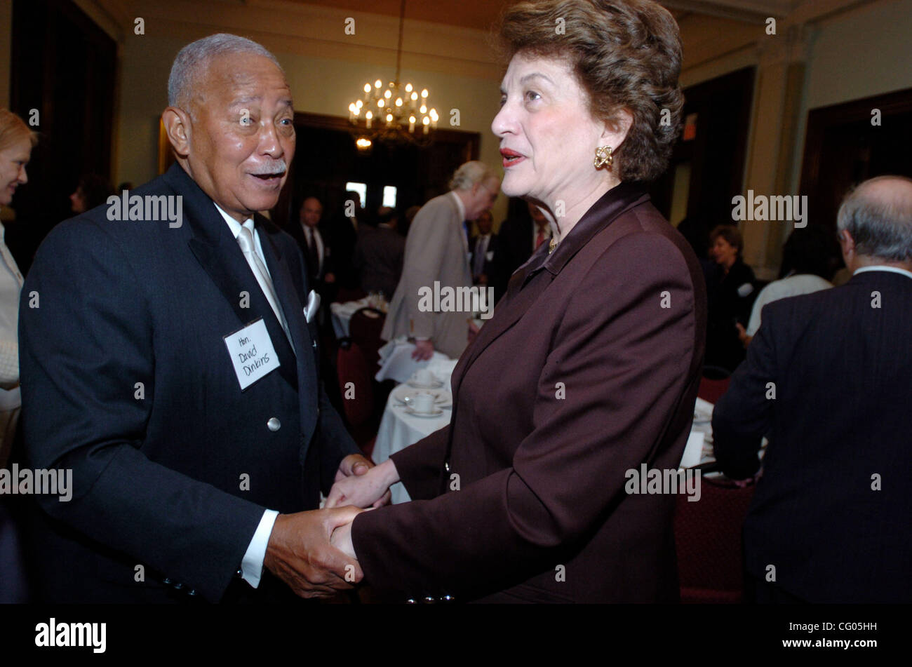 Former NYC Mayor David Dinkins (L) greets Chief Judge Judith Kaye (R ...