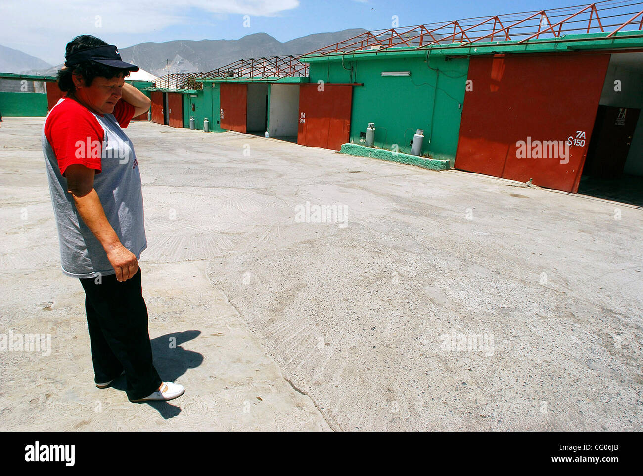 Rancho el Trueno employee Lucy Regalado, 50, outside the rooms to an "armored" hotel in the ...