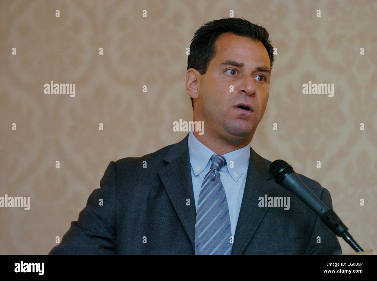 Gary Malin, COO of Citi Habitats speaks as Esther Muller, co-founder ...