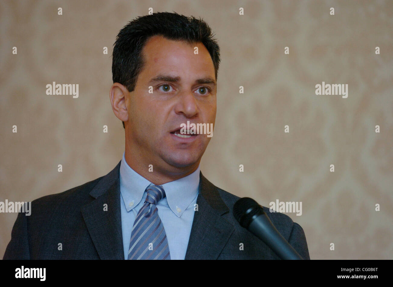 Gary Malin, COO of Citi Habitats speaks as Esther Muller, co-founder ...