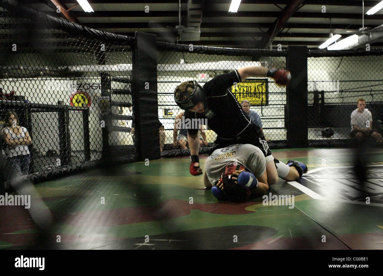 062107 w met cage fighting Staff photo by Allen Eyestone/The Palm Beach ...