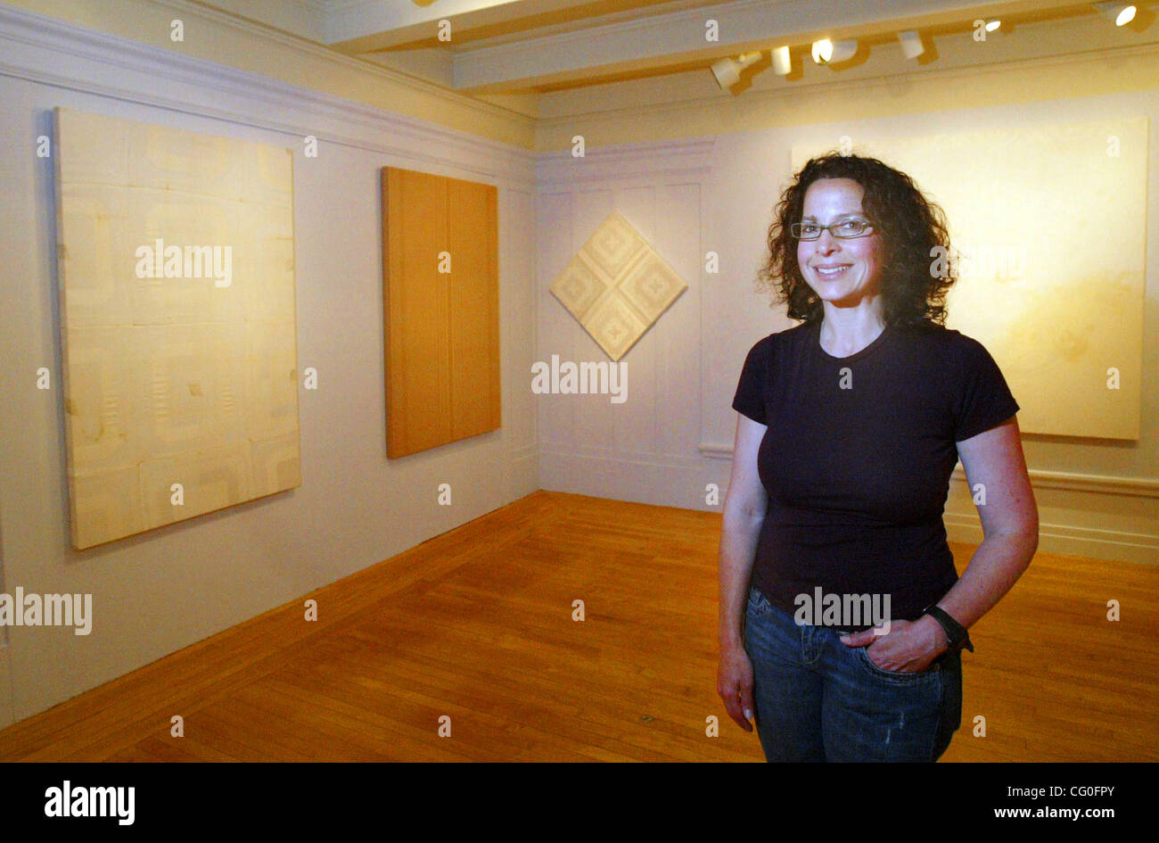 Artist Amy Berk and part of her exhibit "Recoverings" at the Judah L ...