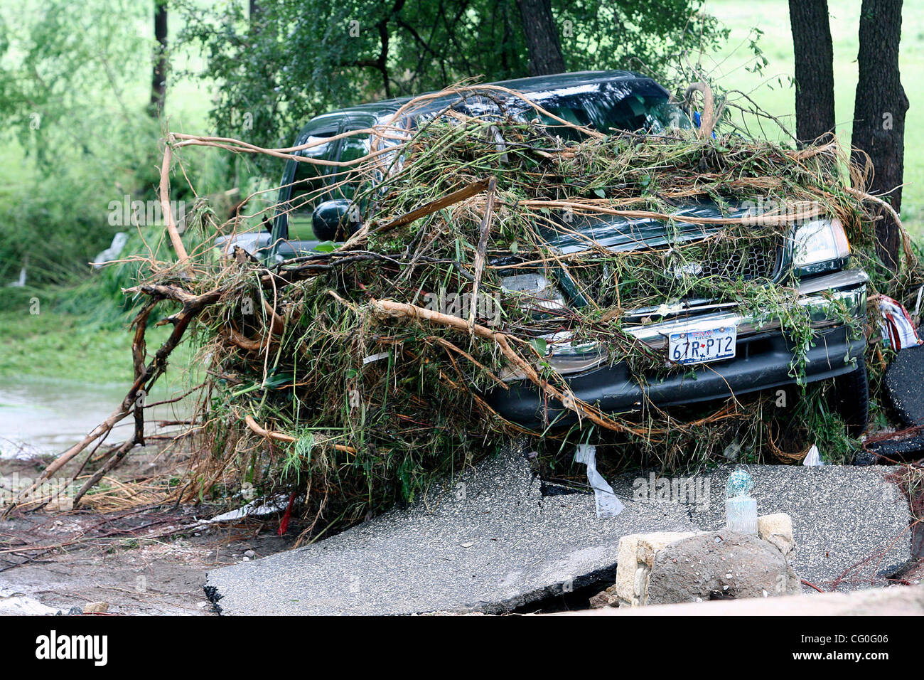 METRO A truck rests in the debris of the Third Street bridge in Marble ...