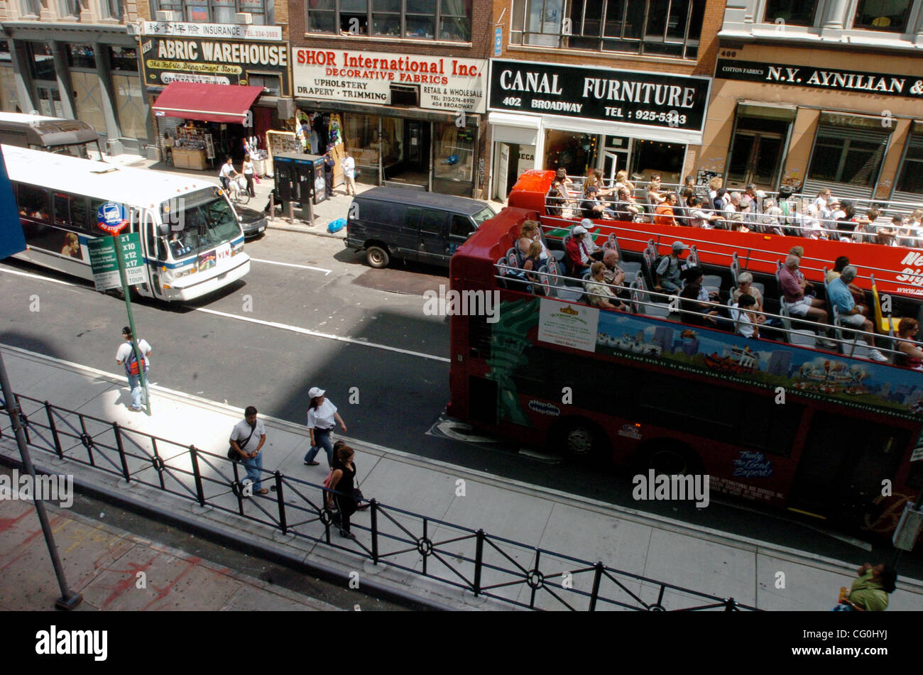 Buses stop at a "Bus Bulb", a new island-like bus stop along lower ...