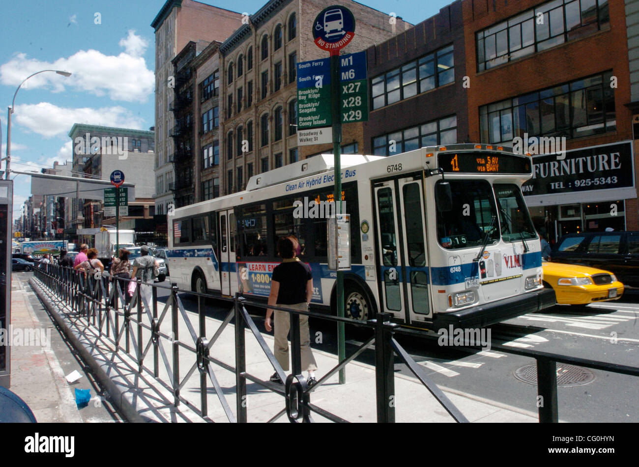 Buses stop at a "Bus Bulb", a new island-like bus stop along lower ...