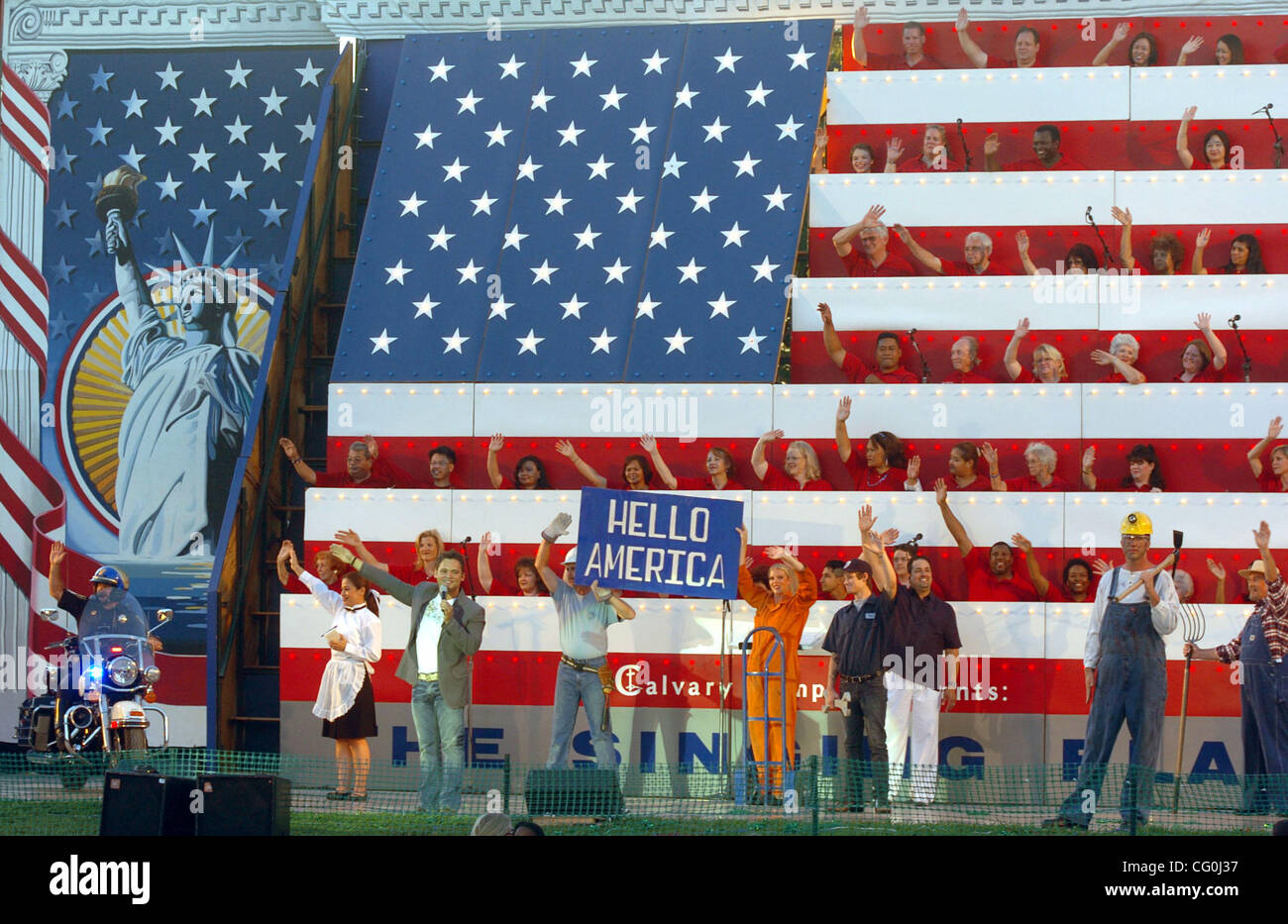 Tony LeBron, third from left at front, sings a song as a tribute all ...