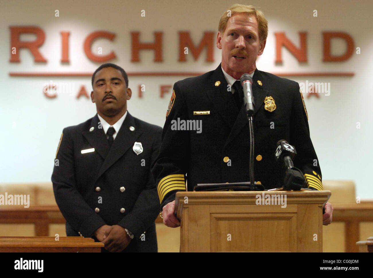 Richmond Fire Department Firefighter Rico Rincon, left, listens as Fire ...