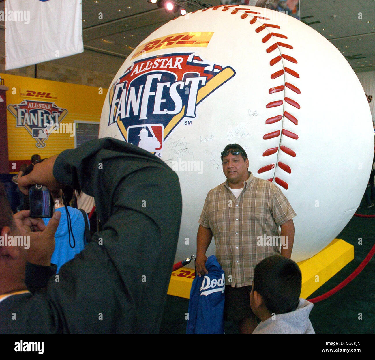 Marcus Pena of San Jose gets his photo with the huge baseball during ...