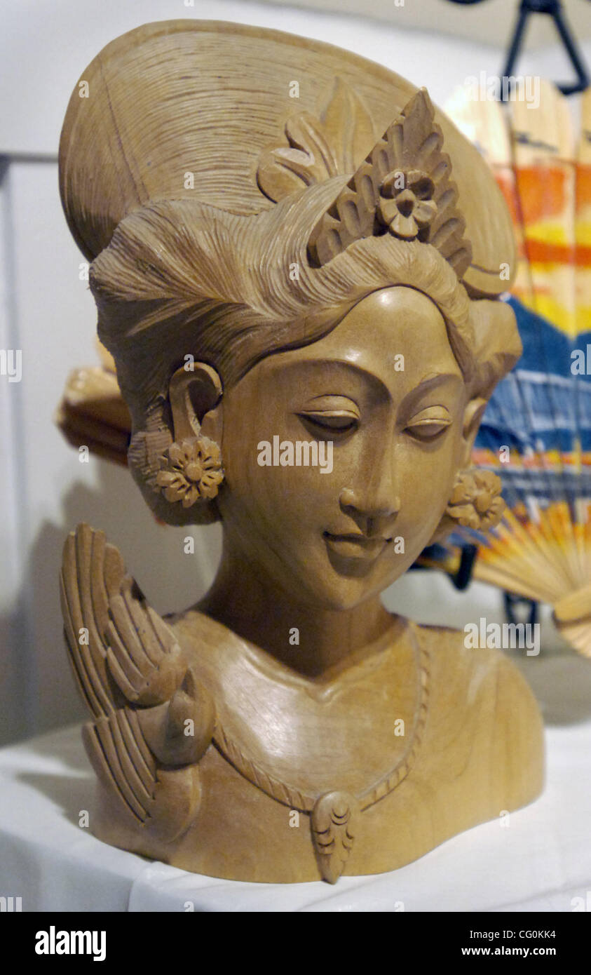 This piece, a wooden sculpture of the famous Filipino fictional ...
