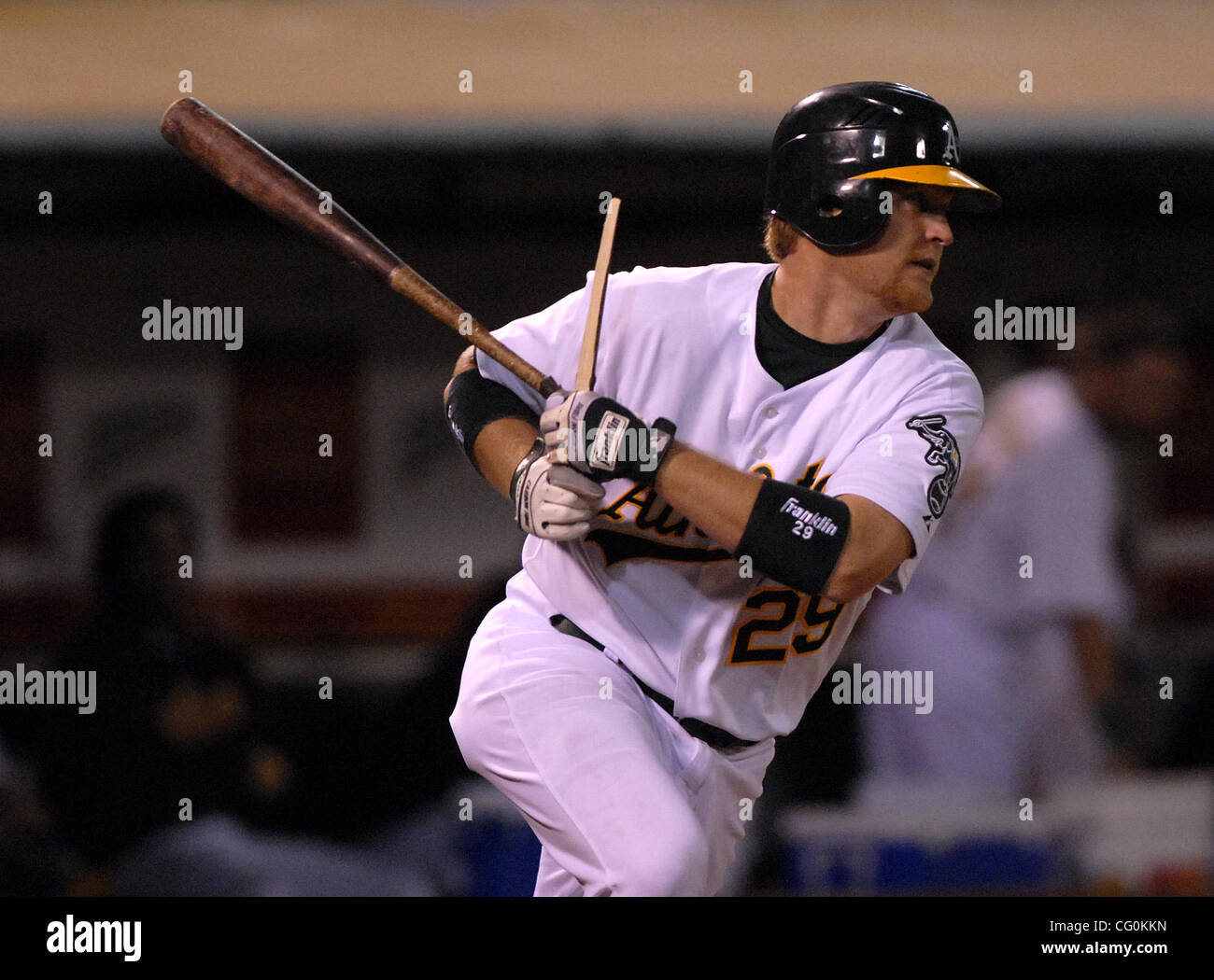 Oakland A's Dan Johnson breaks his bat on a hit and is thrown out to ...