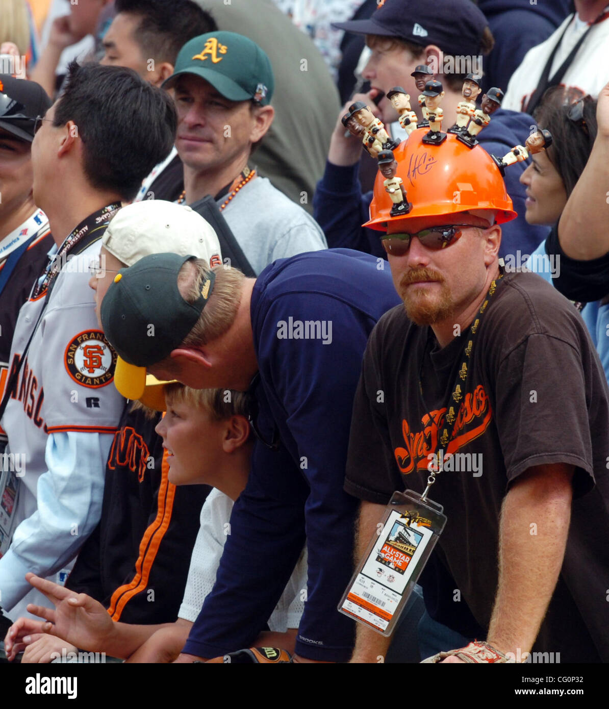 Fan, Tony Natale of Sebastopol, shows his spirit with his bobblehead ...