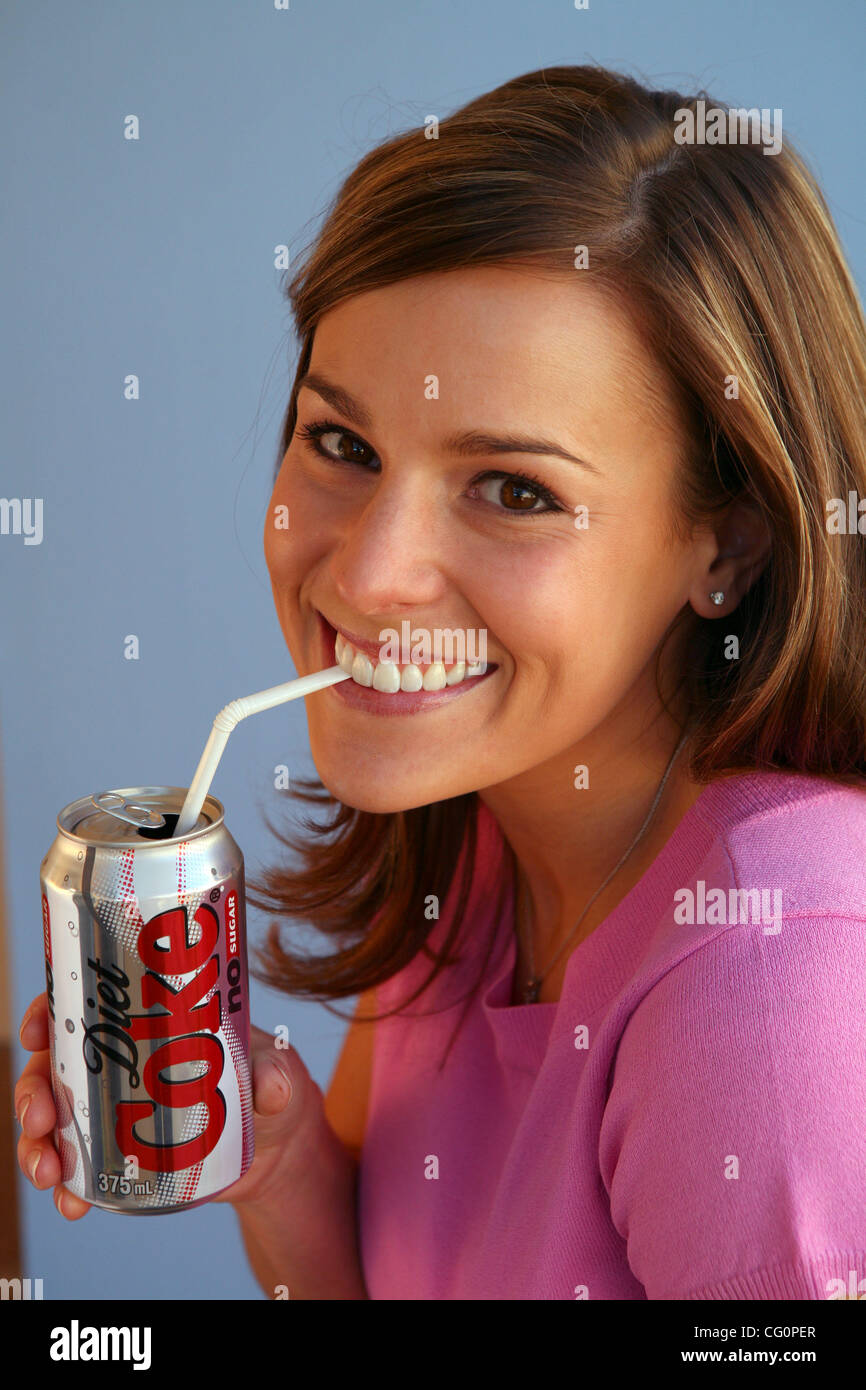 Jul 11, 2007 - Los Angeles, CA, USA - A young woman drinking a Diet ...