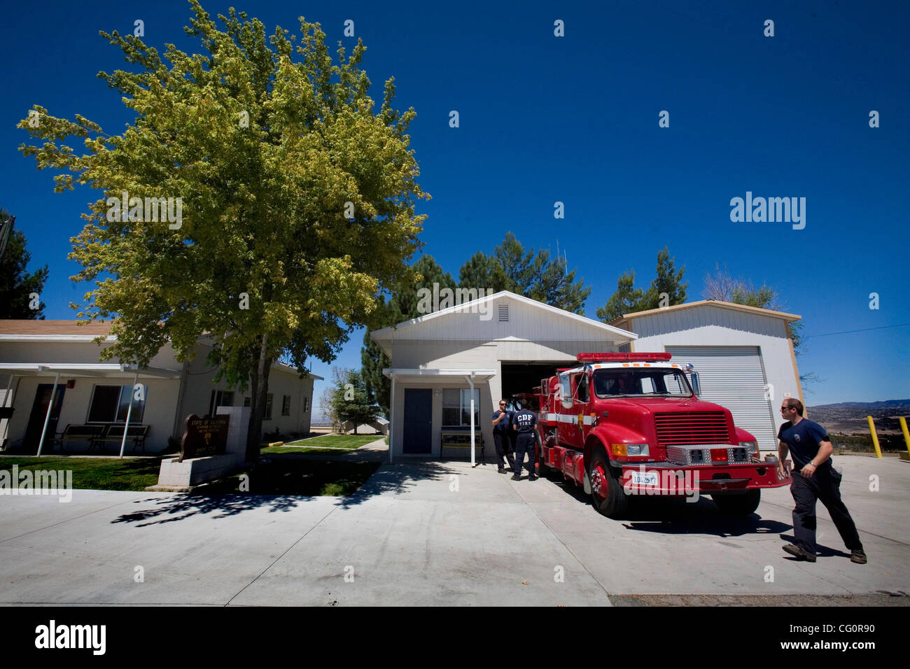 July 12, 2007 Boulevard, CA. Firefighter, DAN COOK, right, rounds the ...