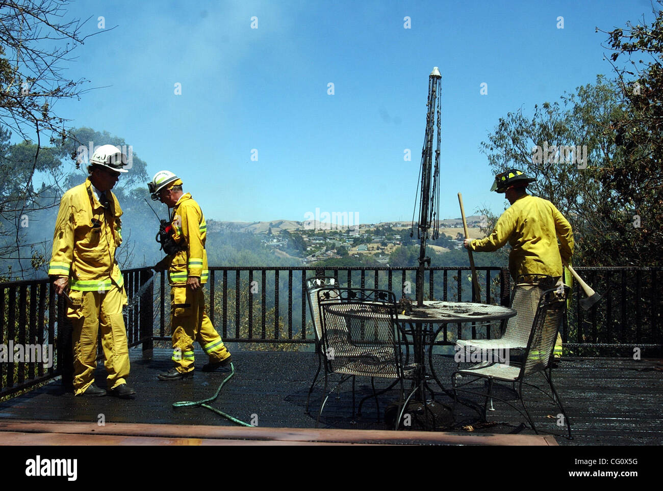 A two-alarm grass fire is contained by Pinole Fire Fighters Monday ...