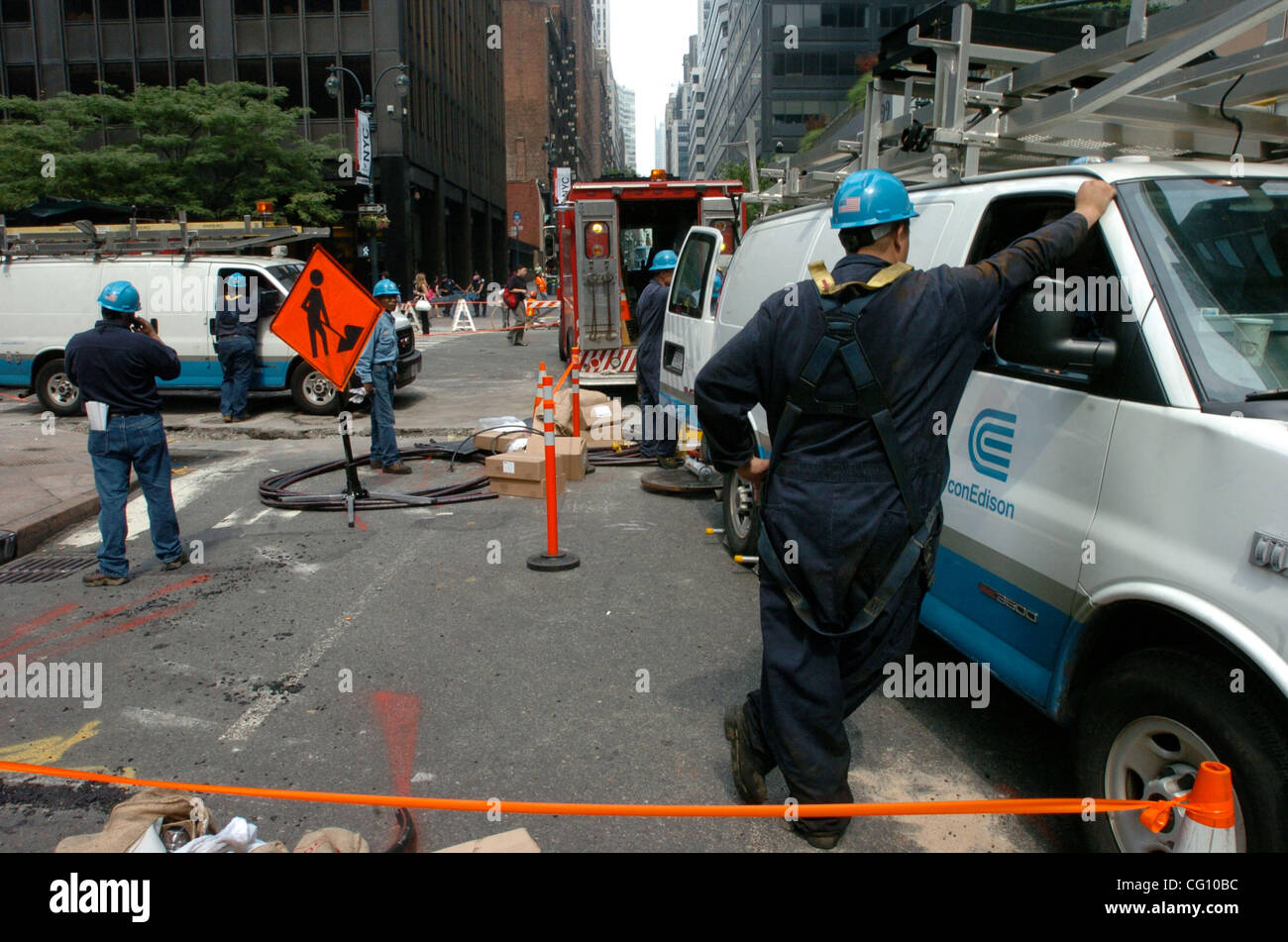ConEd construction crews along 3rd Avenue following yesterday's steam ...