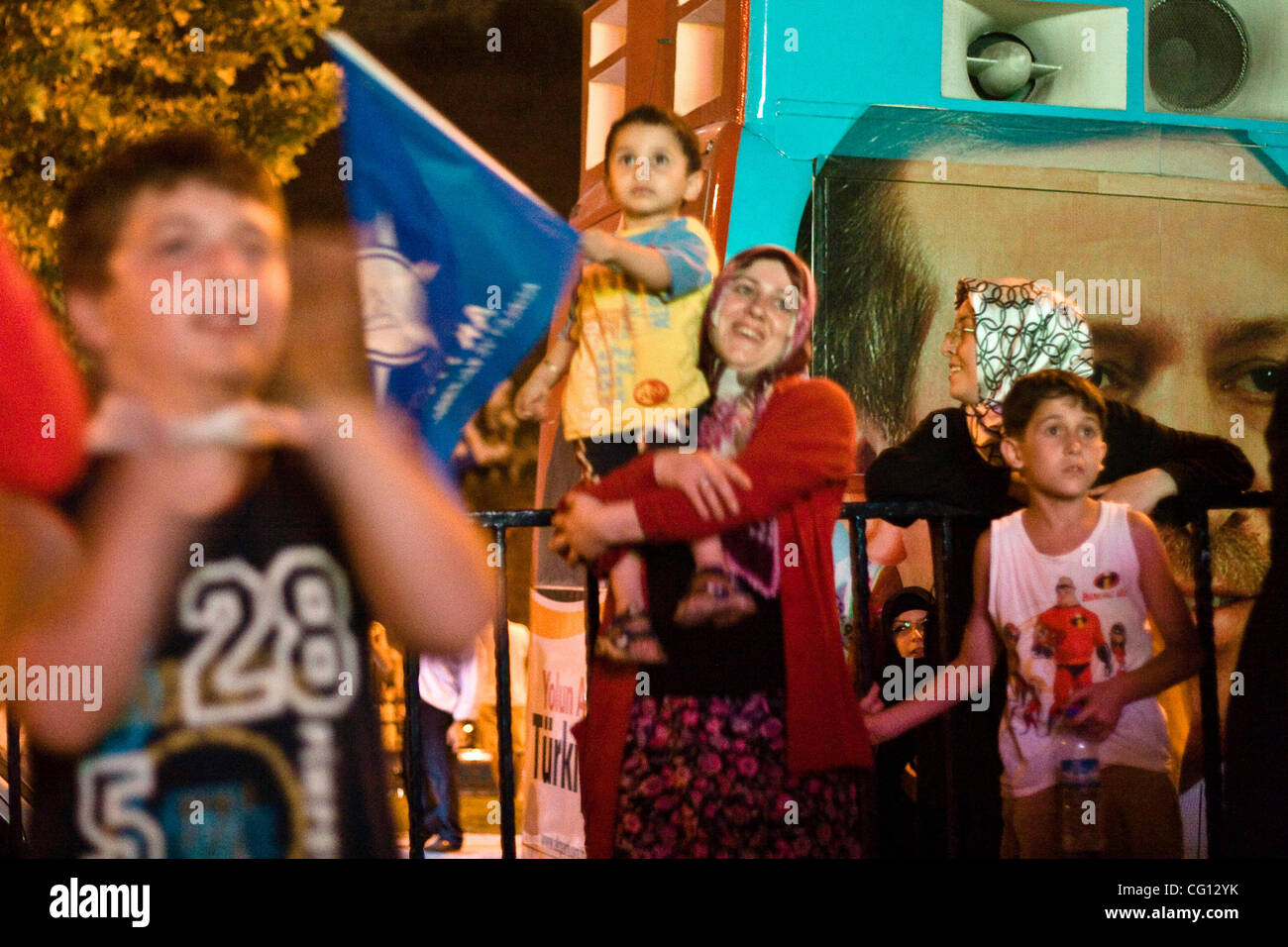 Supporters of Turkey's ruling AK Party celebrate at party headquarters ...