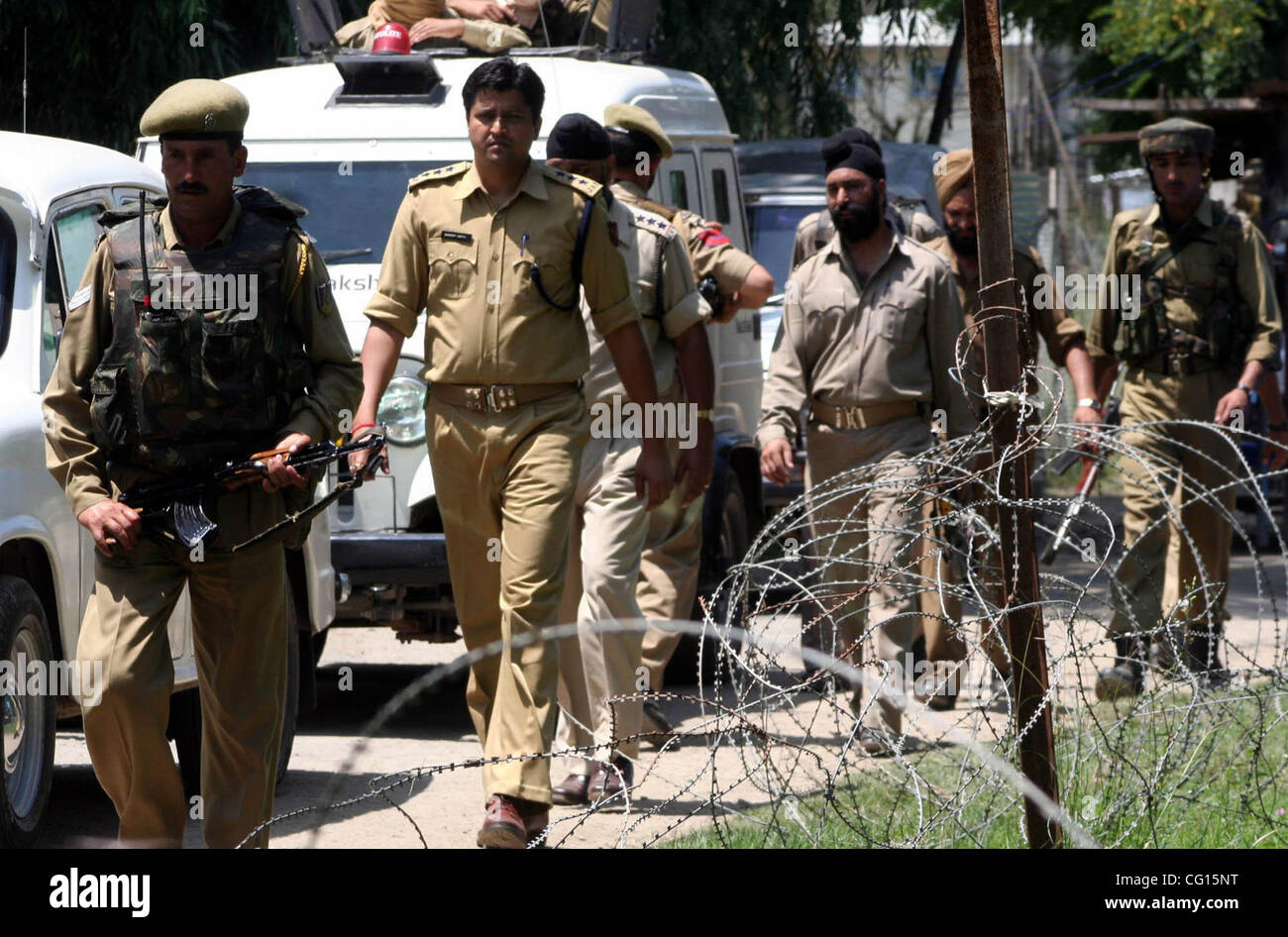 Indian paramilitary soldiers coming out of their battalion headquarters ...