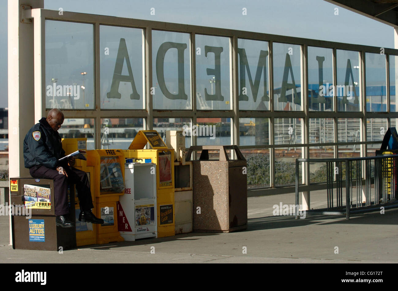 A lone security guard at the closed Alameda ferry station in Alameda ...