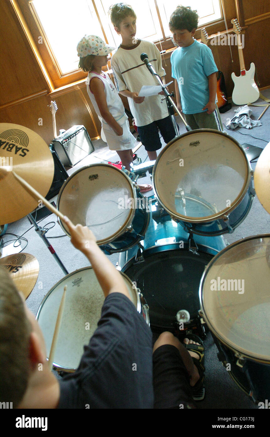 Local kids play Green Day tunes during BandWorks Summer Camp at the R.E ...