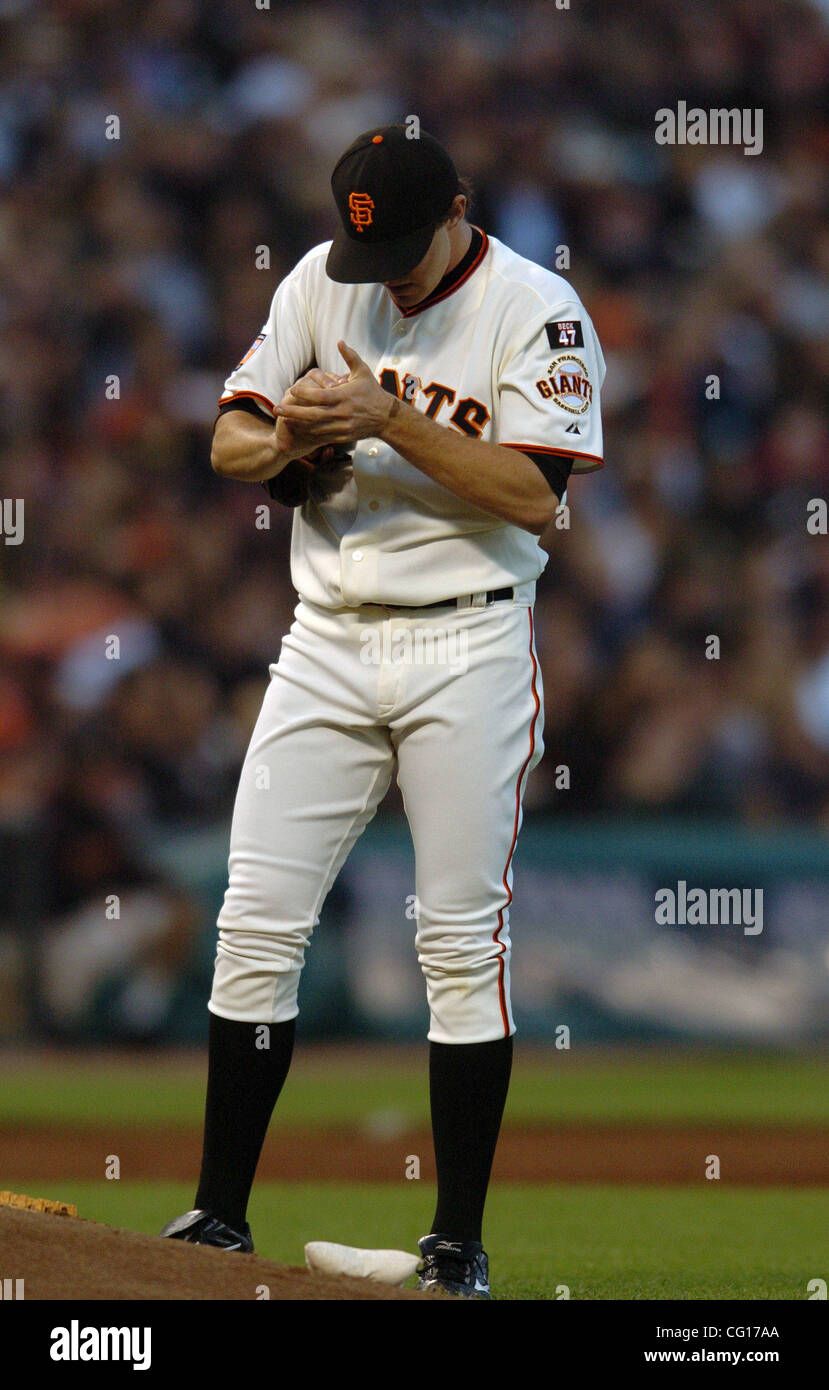 Giants' pitcher Barry Zito reacts after Marlins' Cody Ross hits a homer ...