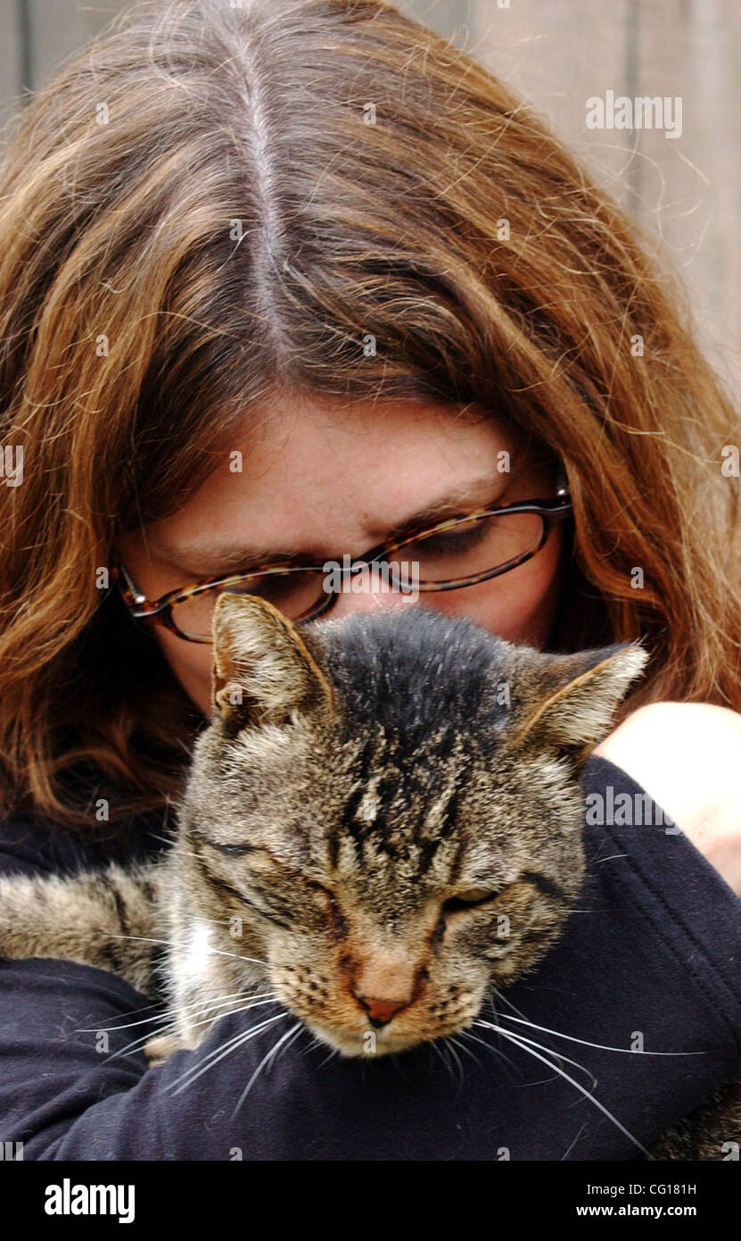 Julianne Reidy holds Stumpy who was recently trapped and neutered and ...